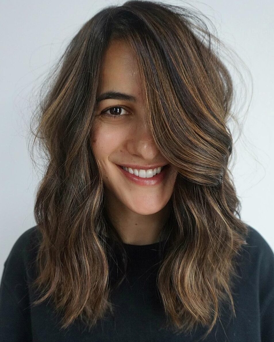 30 Flattering Hairstyles for Long Faces You’ll Want to Try in 2022
